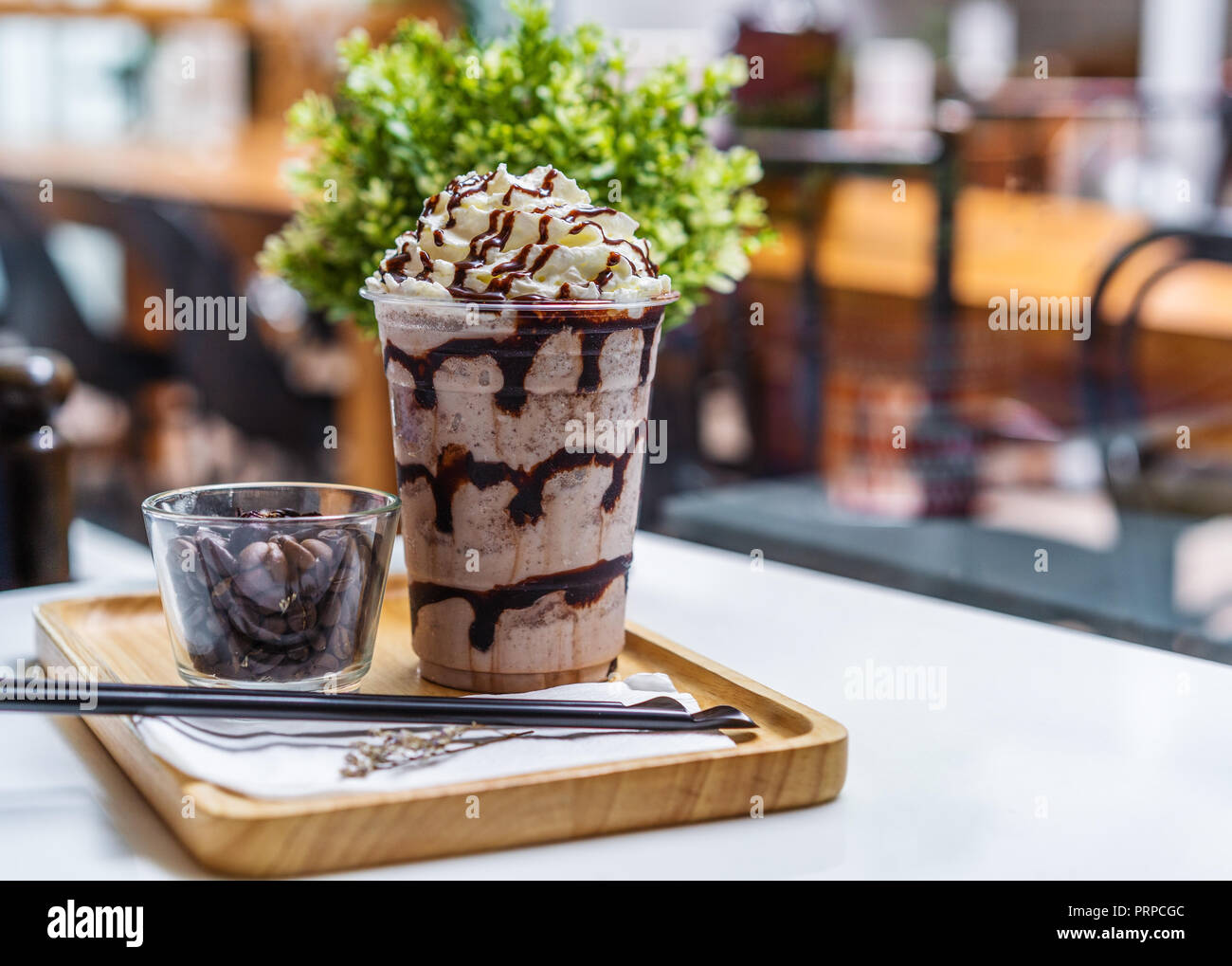chocolate frappe with whipped cream on table Stock Photo - Alamy