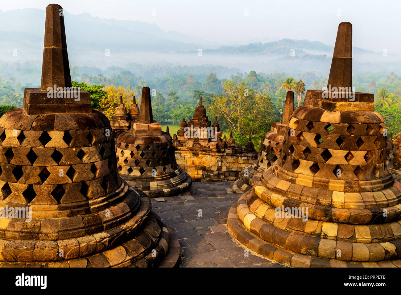 The beautiful stupas of Borobudur Temple complex, Yogyakarta, Indonesia ...