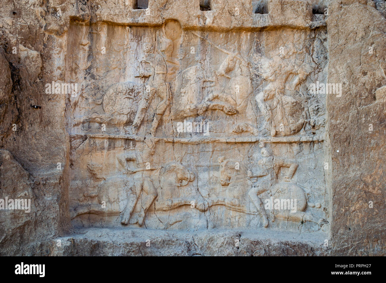 A carving underneath the tomb of Darius I at Naqsh-e Rostam, Iran Stock ...