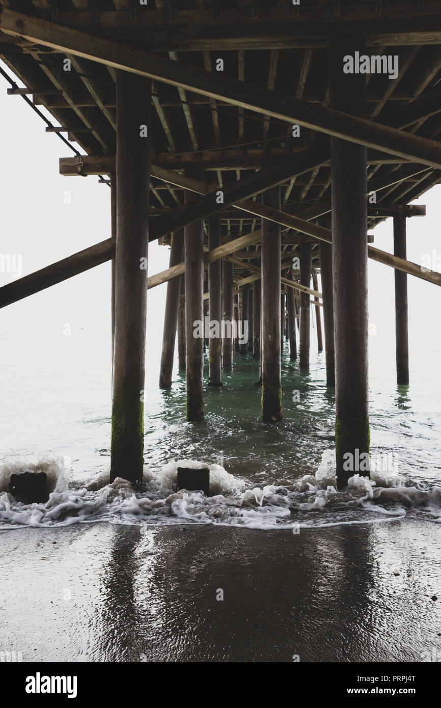 Under the pier Stock Photo - Alamy