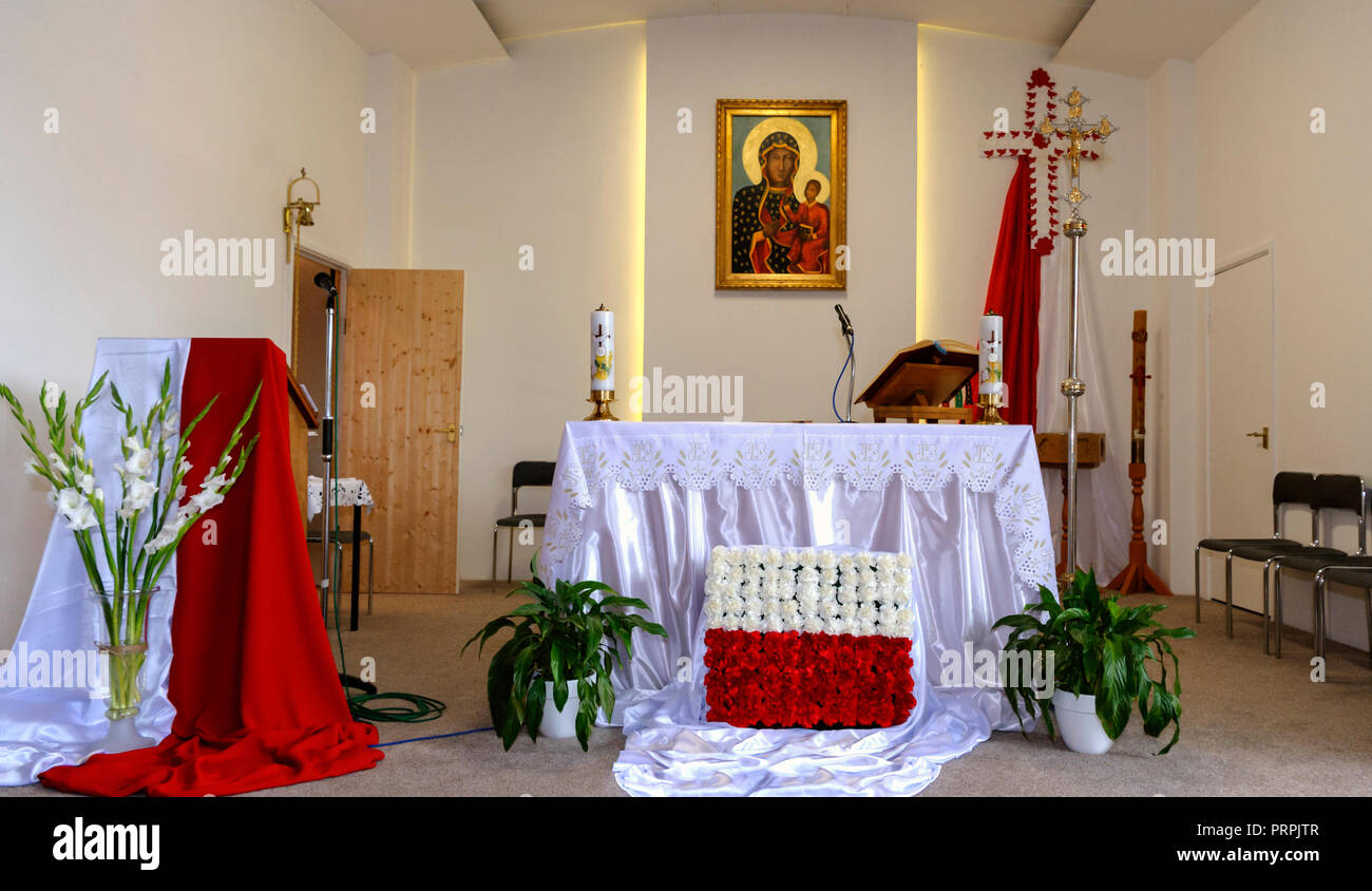 The main altar - decorated in national colors - white and red Stock ...