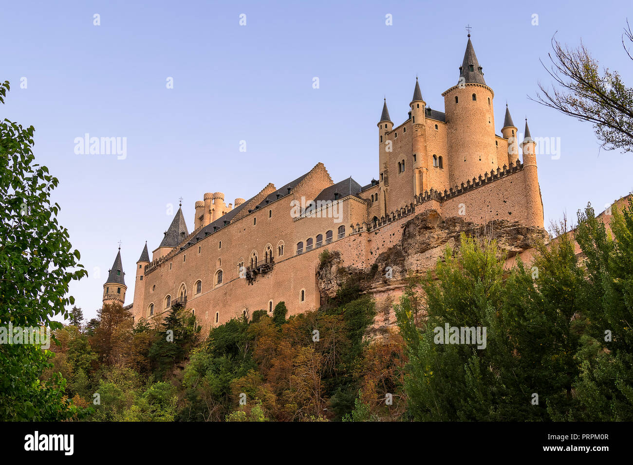 Segovia Alcazar at sunset, in Spain. In 1985 the old city of Segovia ...