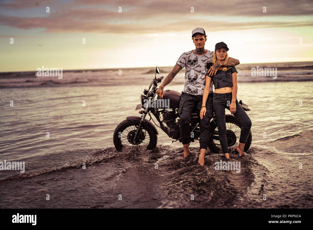 Stylish couple beach hi-res stock photography and images - Alamy