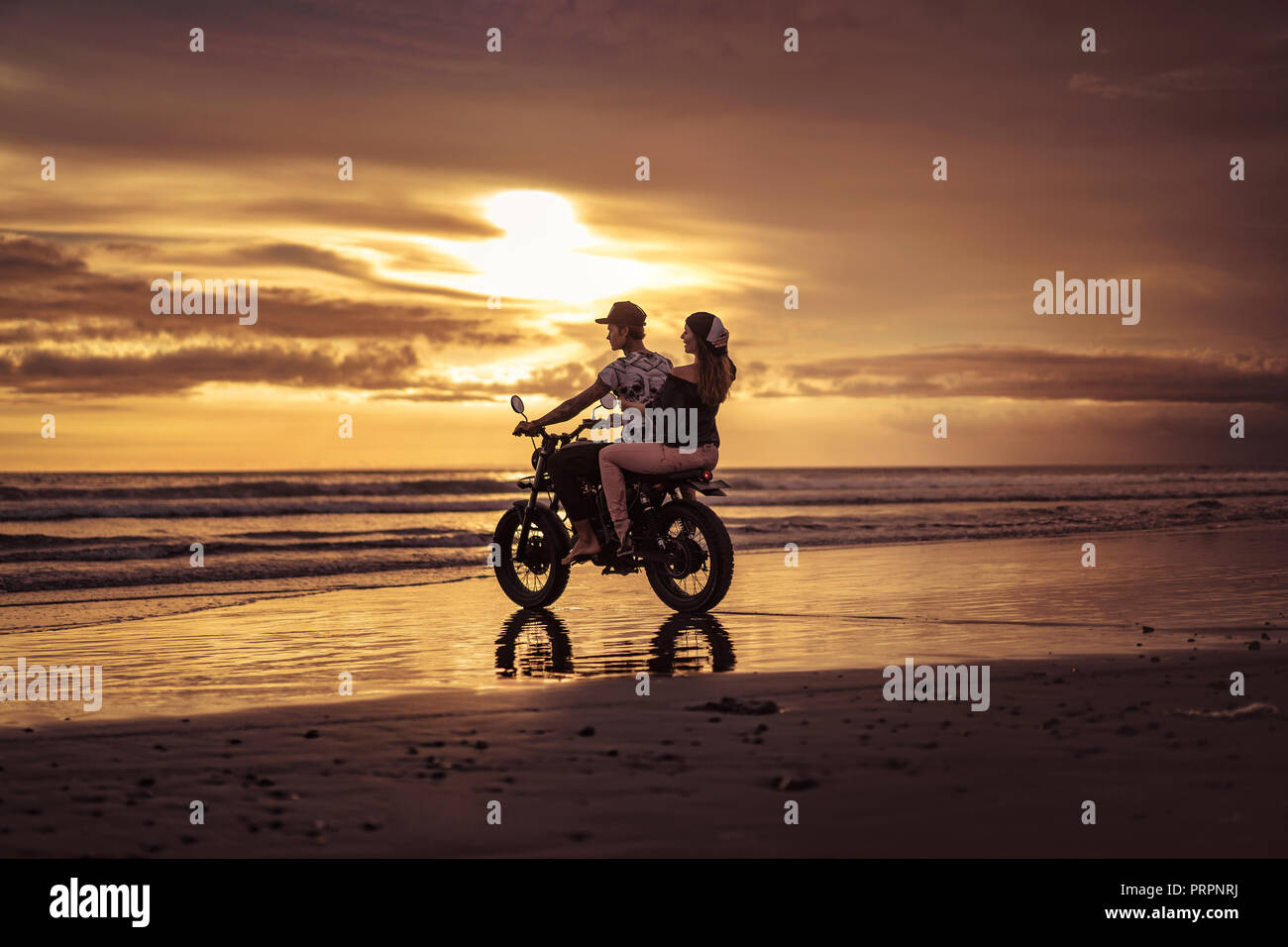 Couple riding motorcycle hi-res stock photography and images - Alamy