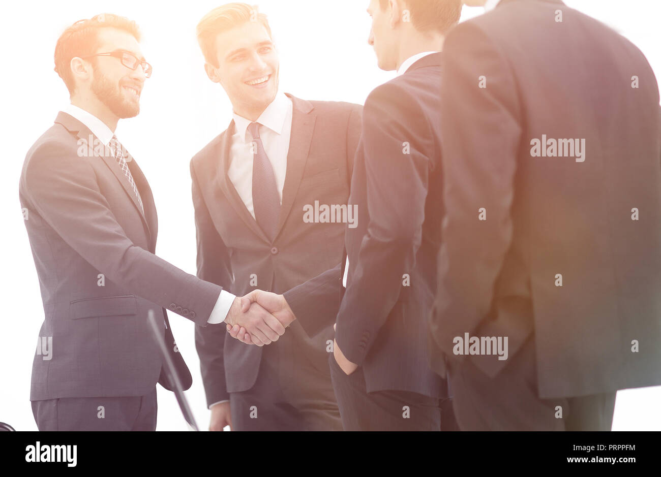Business people shaking hands as a symbol of effective negotiations ...