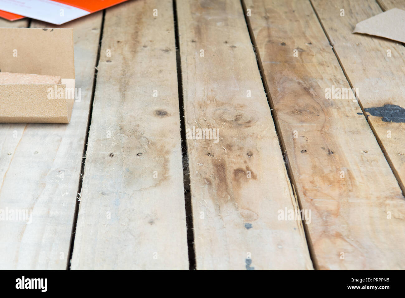 Carpentry background of wooden boards in a workshop Stock Photo - Alamy