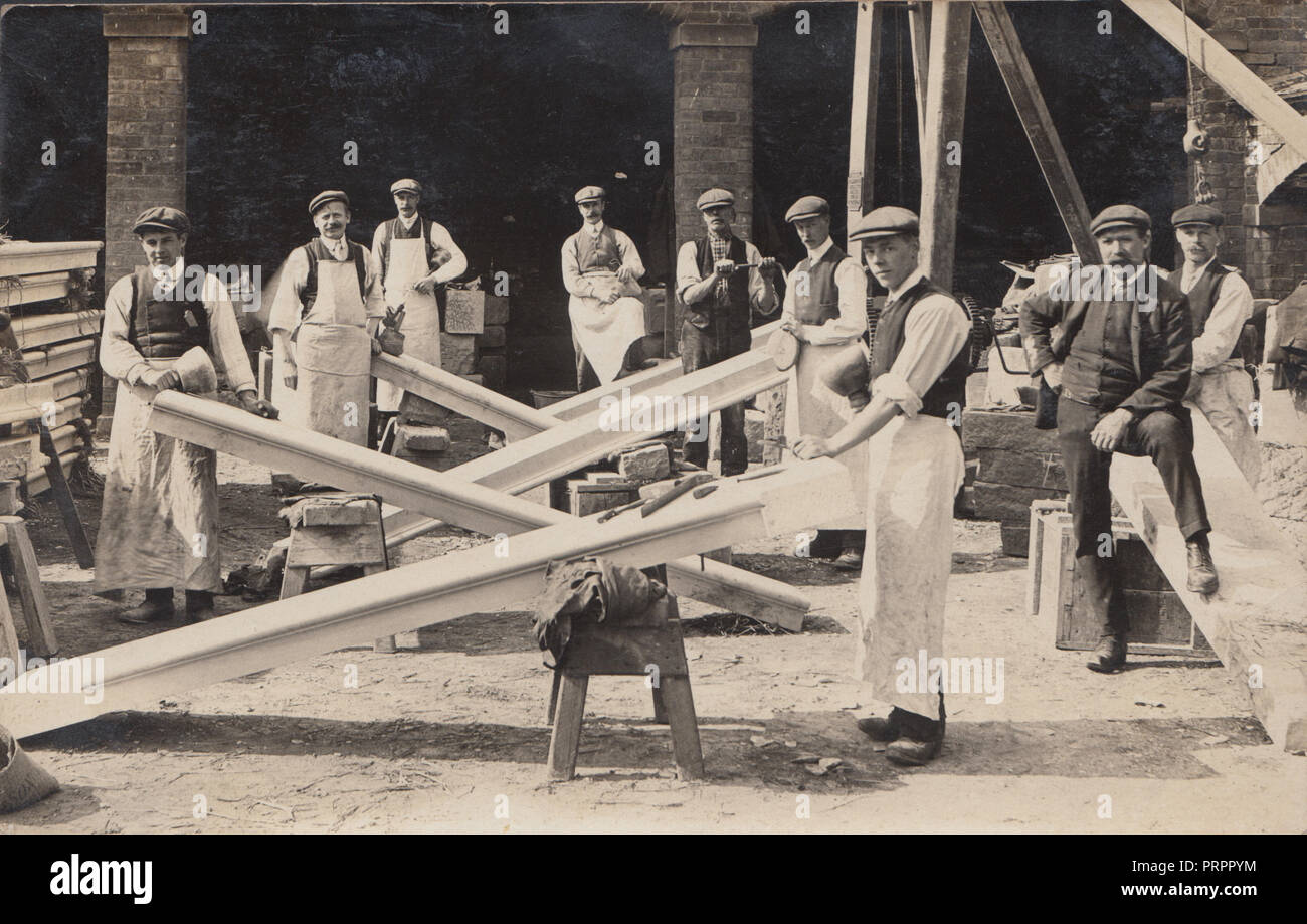 Overalls construction workers group hi-res stock photography and images ...