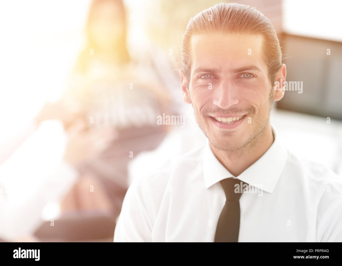 successful young business men on blurred background.photo with copy ...