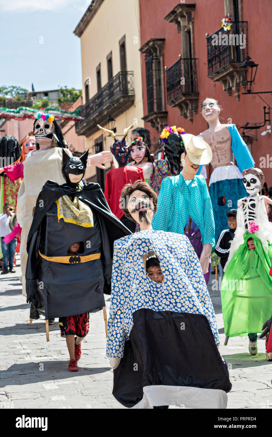 Giant paper-mache puppets called Mojigangas participate in the annual ...