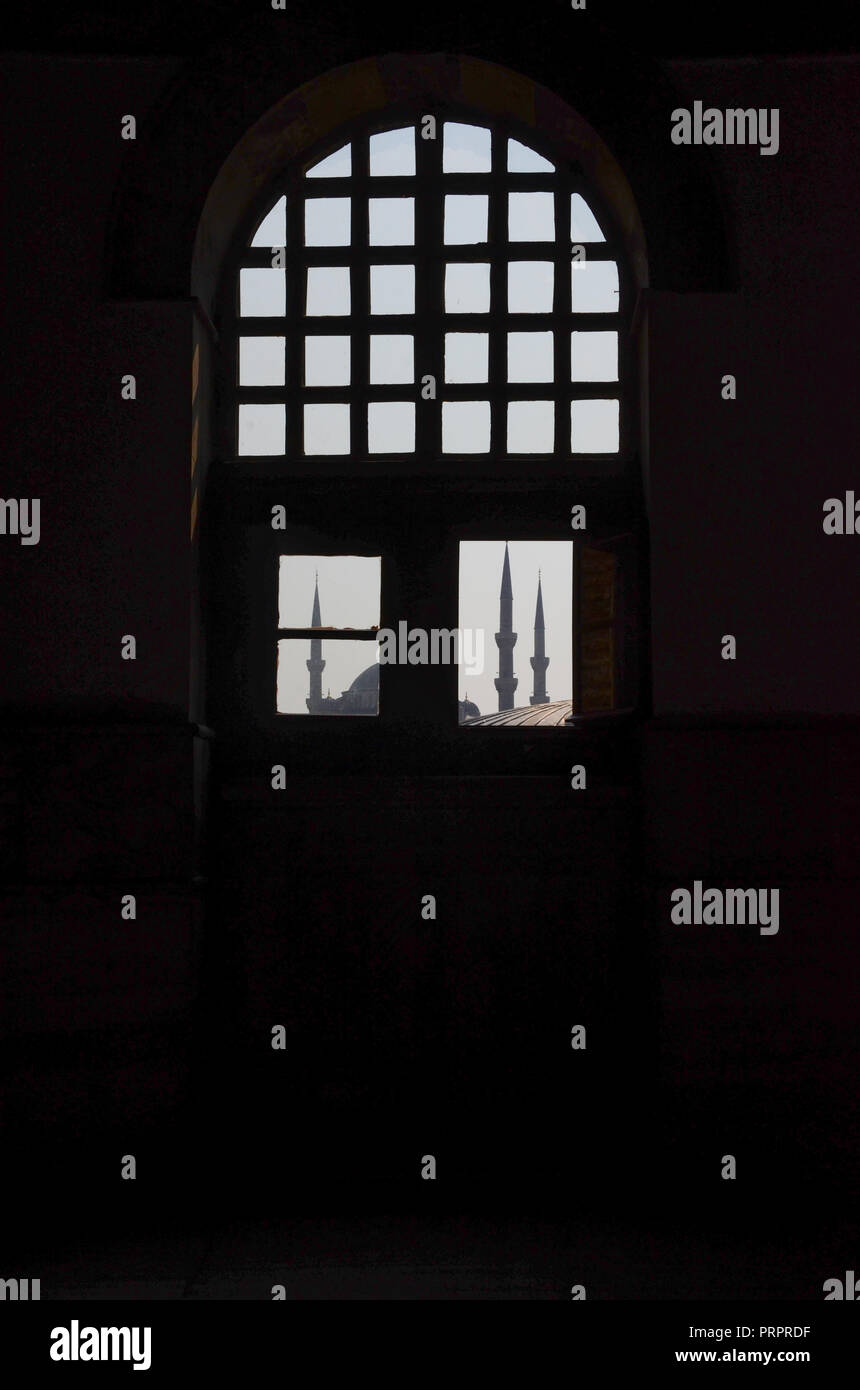 Scenic view of rooftops, Mosque Domes and Turkish architecture behind a ...