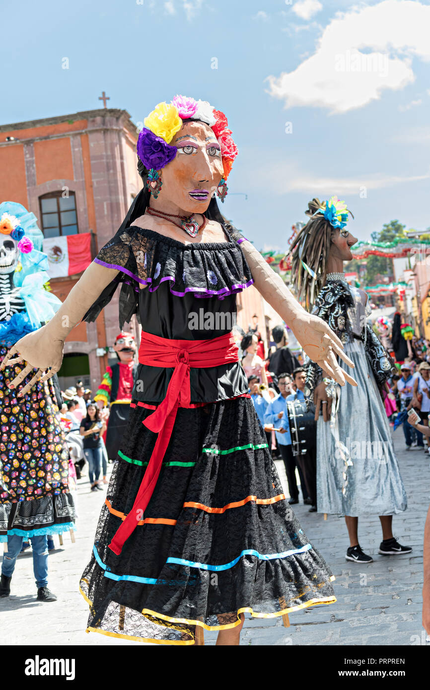 Giant paper-mache puppets called Mojigangas participate in the annual ...