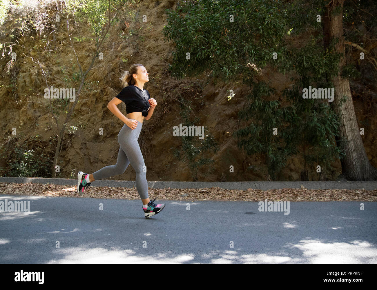 Black running pants hi-res stock photography and images - Alamy
