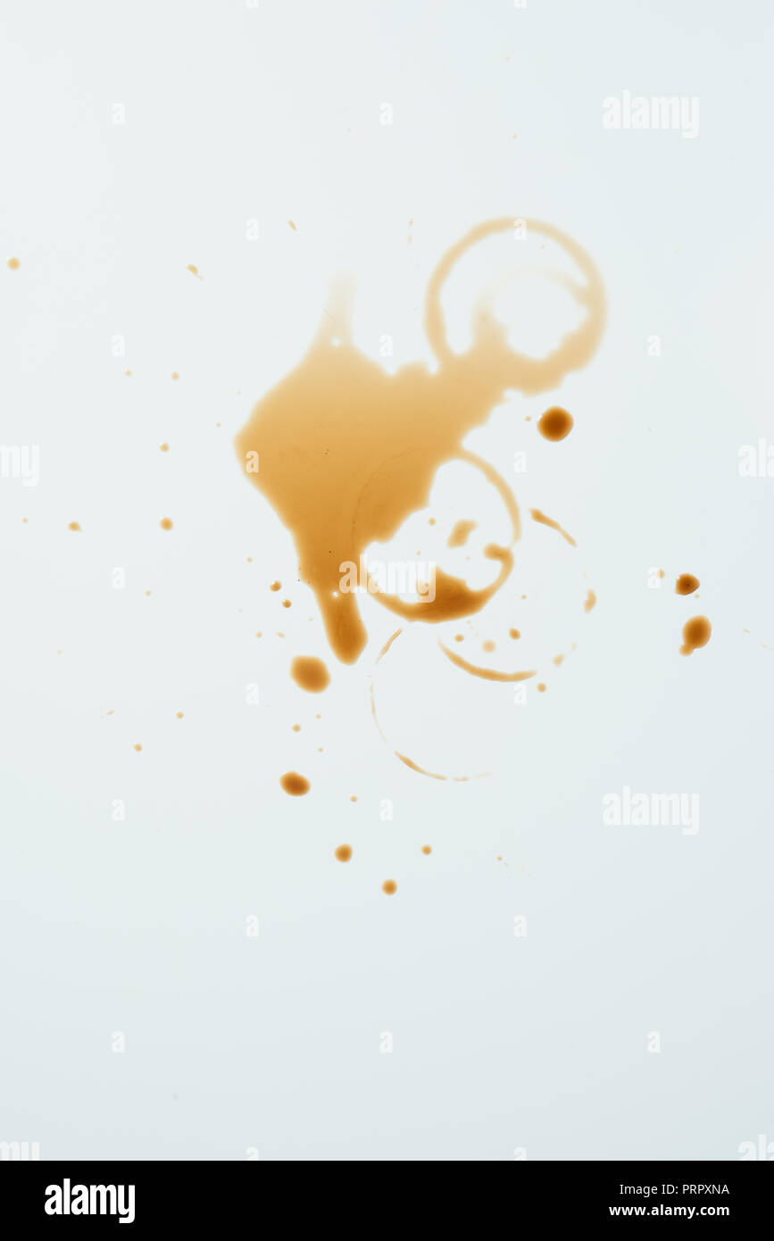 top view of messy white surface with coffee blots Stock Photo - Alamy