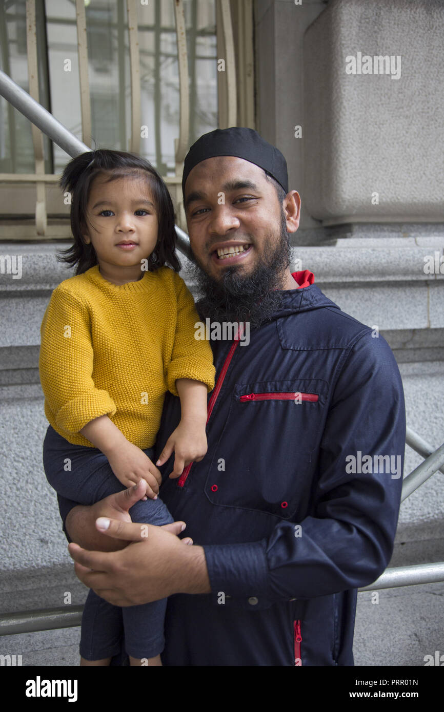 Young father and daughter at the American Muslim Day Parade in New York ...
