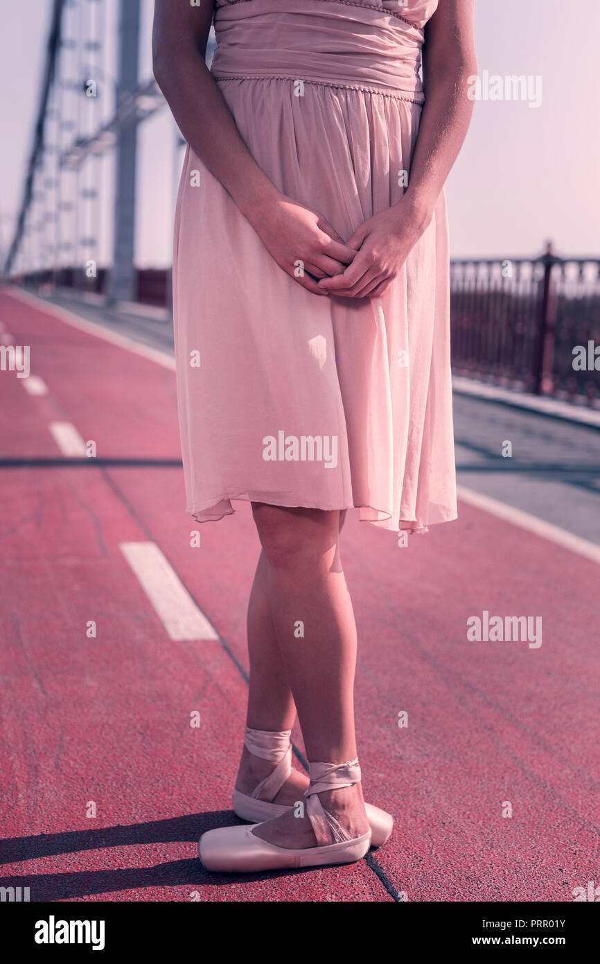 Nice professional female dancer standing in the primary pose Stock ...