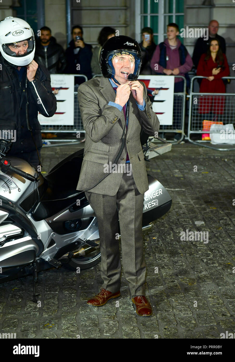 Ben Miller arriving on a motorbike for the Johnny English Strikes Again ...