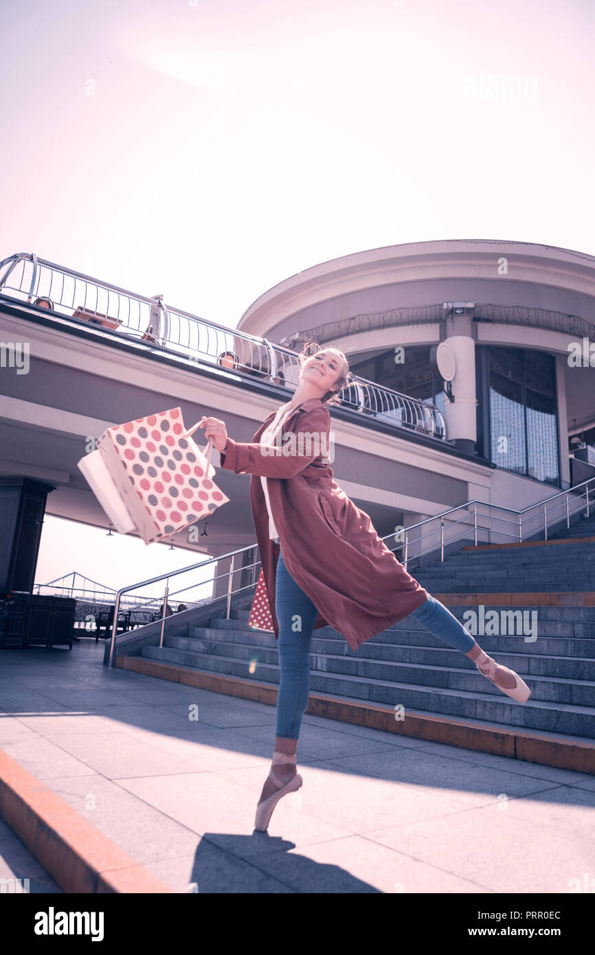 Joyful nice young woman feeling very happy Stock Photo - Alamy