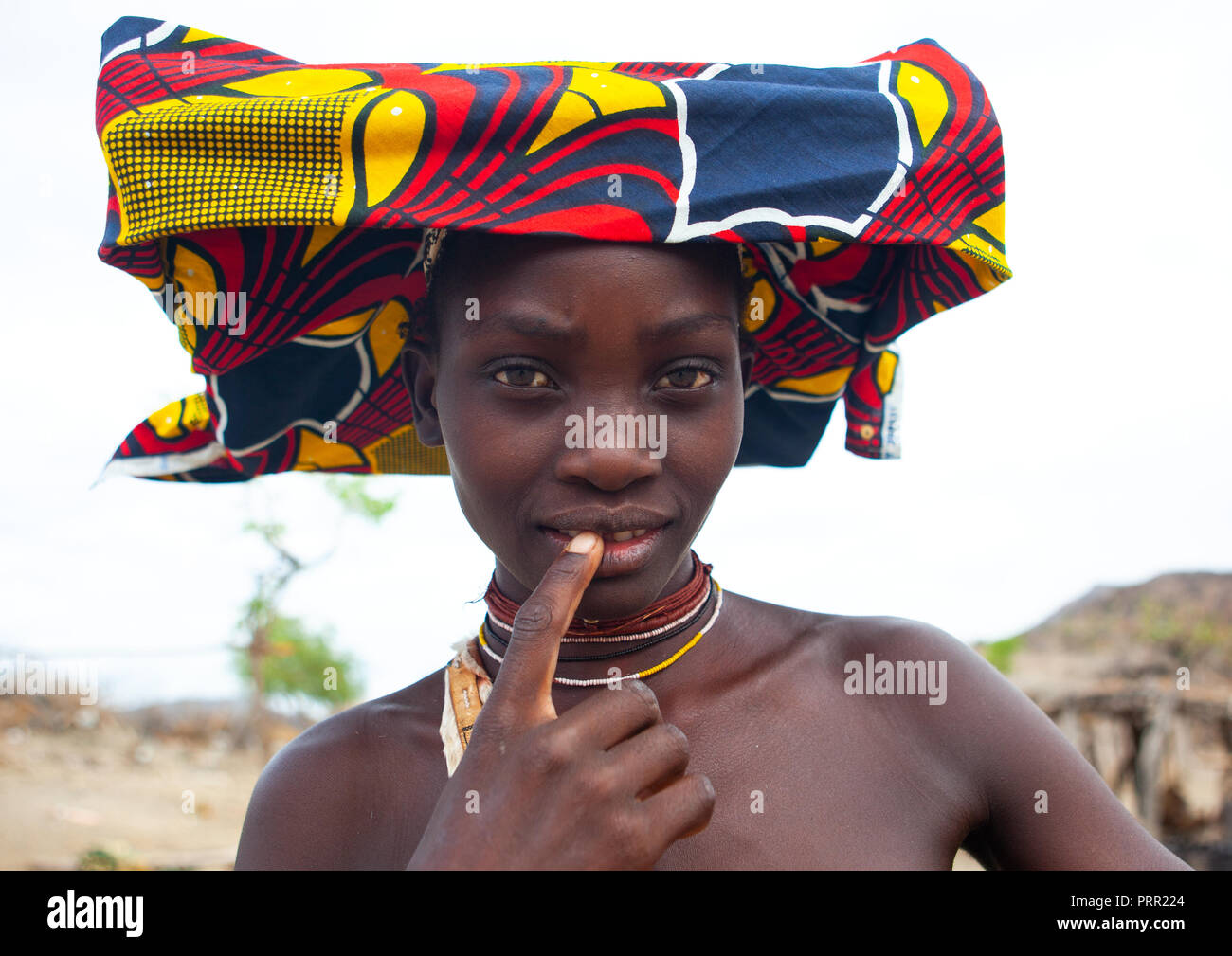 Portrait of a Mucubal tribe women wearing colorful headwears, Namibe ...