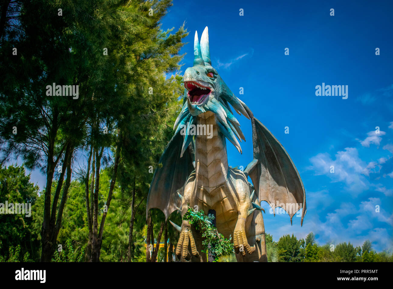 Angry blue dragon model Stock Photo - Alamy