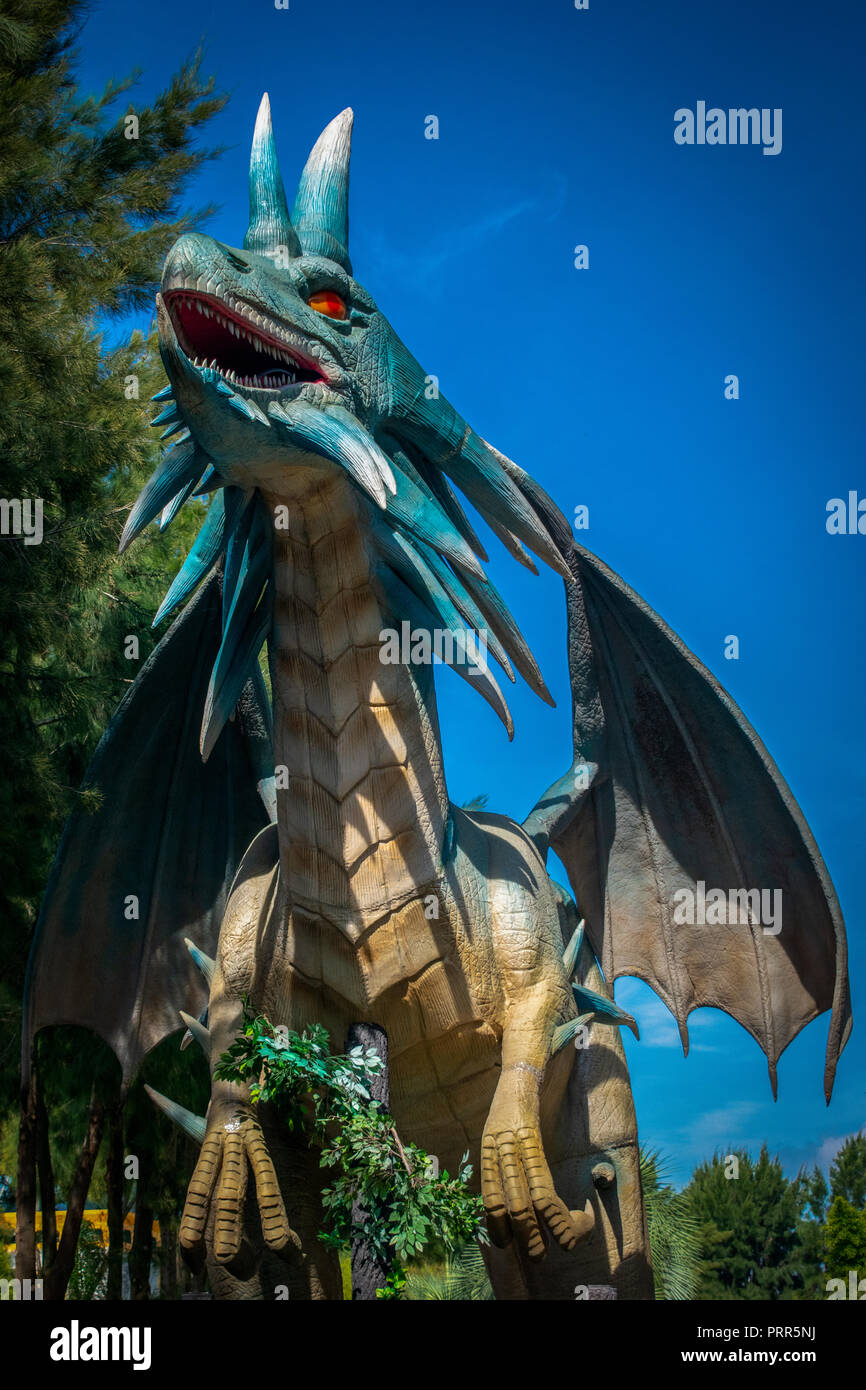 Angry blue dragon model Stock Photo - Alamy