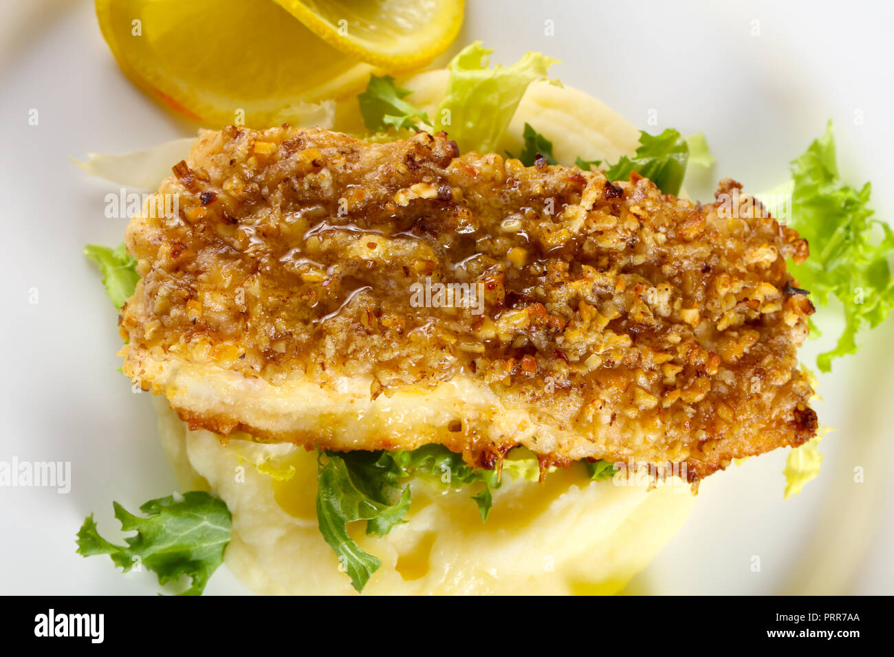 Baked Cod fish with mashed potato Stock Photo - Alamy