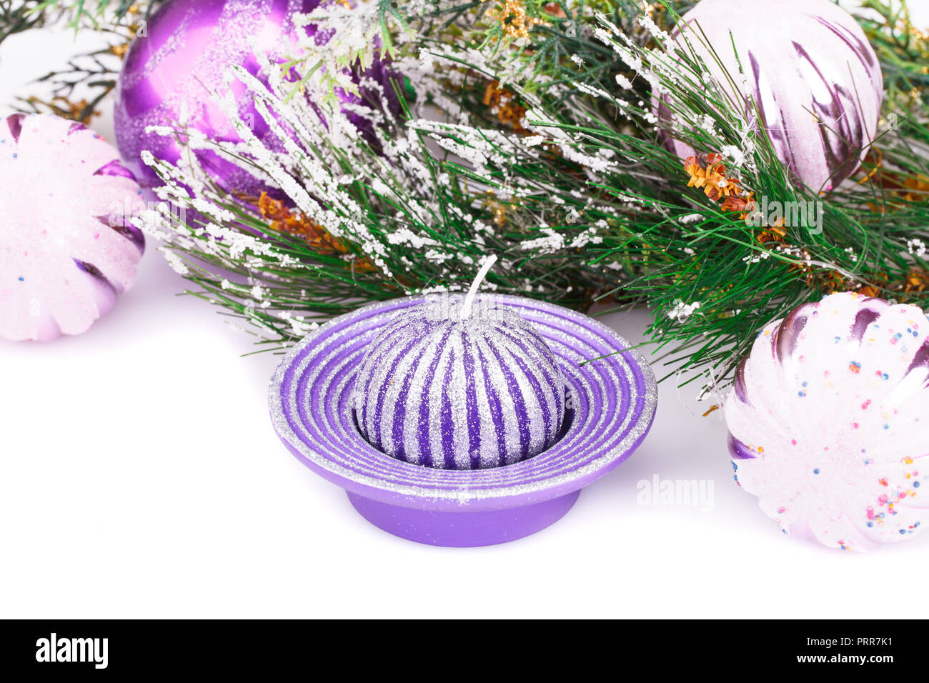 Christmas pink balls, candle and fir tree on white background Stock ...