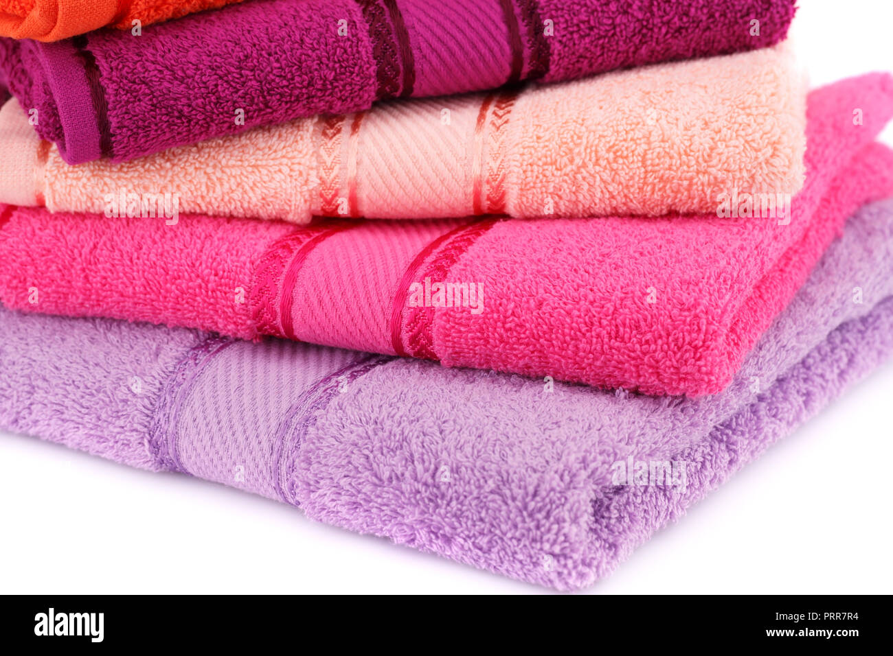 Colorful towels stack closeup picture Stock Photo - Alamy