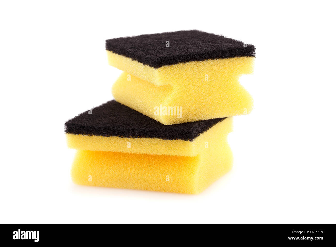 Two sponges isolated on white background Stock Photo - Alamy