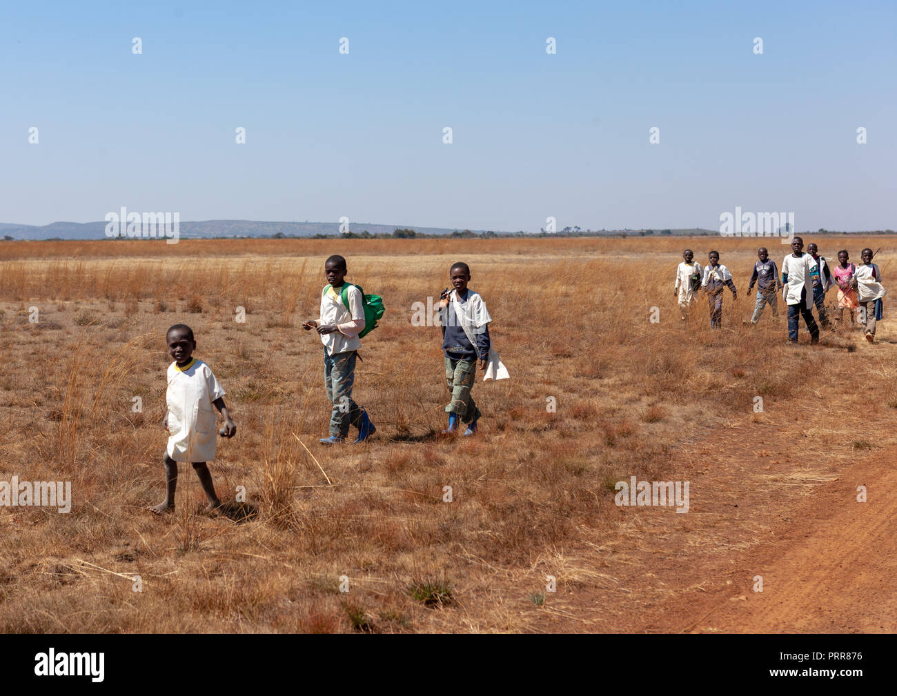 Children in school uniforms in the countryside, Huila Province, Lubango ...