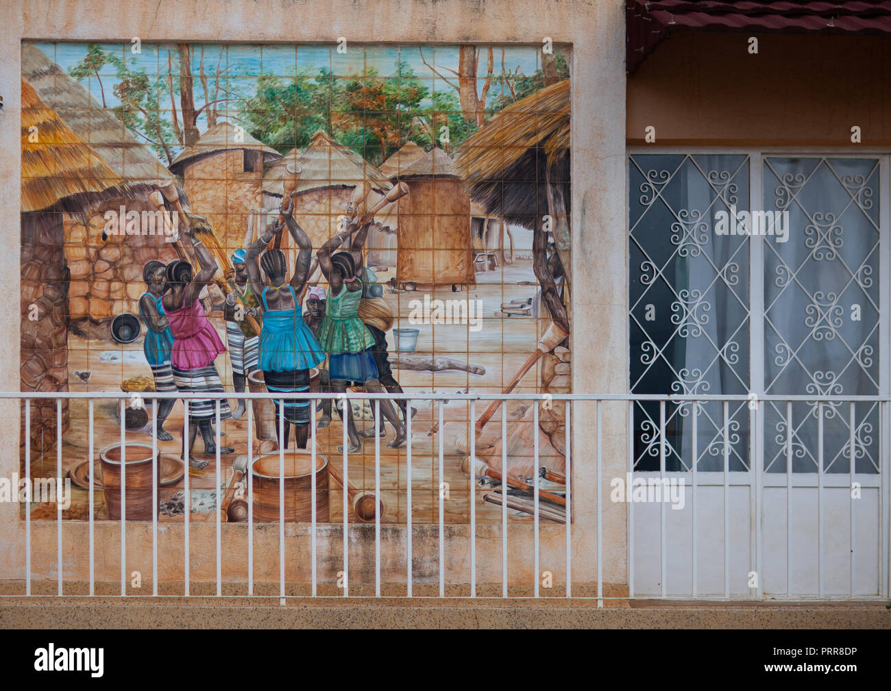 Mosaic depicting a rural scene in an angolan village on a balcony house ...