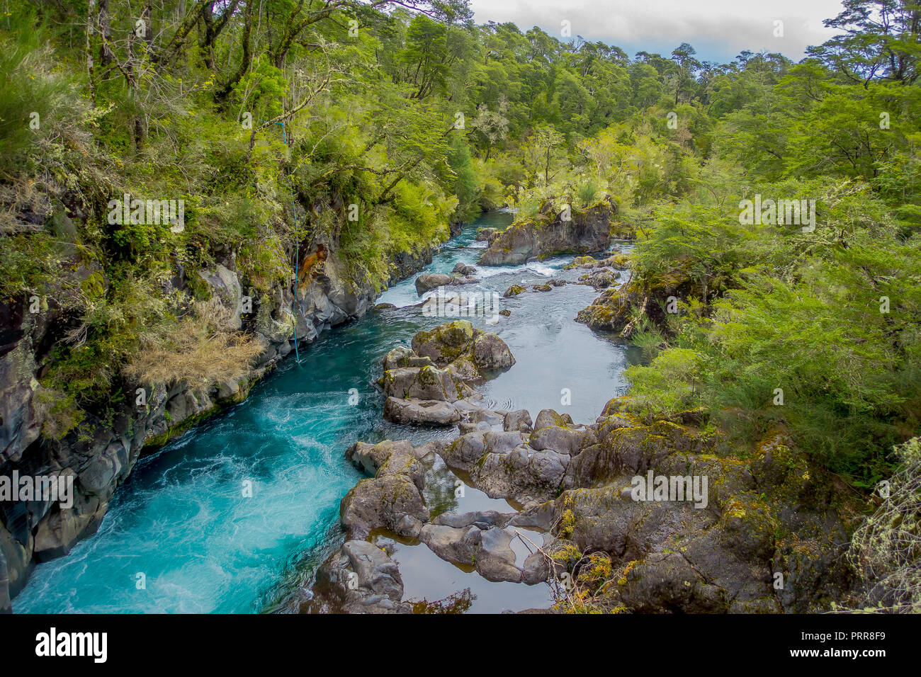 Petrohue River Flowing Through The Mountain In Petrohue Llanquihue