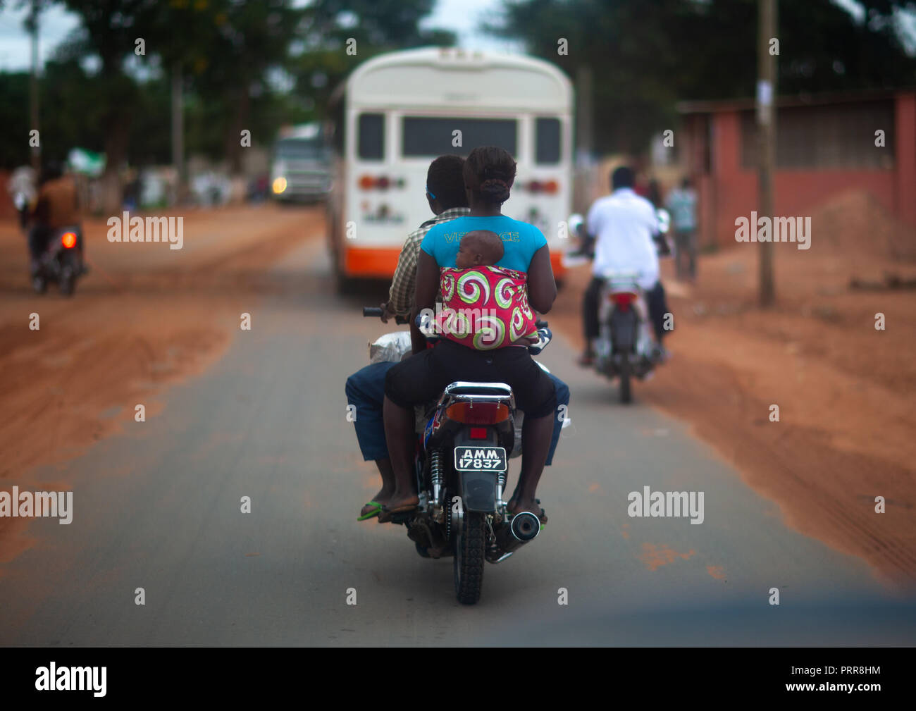 Mother and children sitting on a motorbike hi-res stock photography and ...