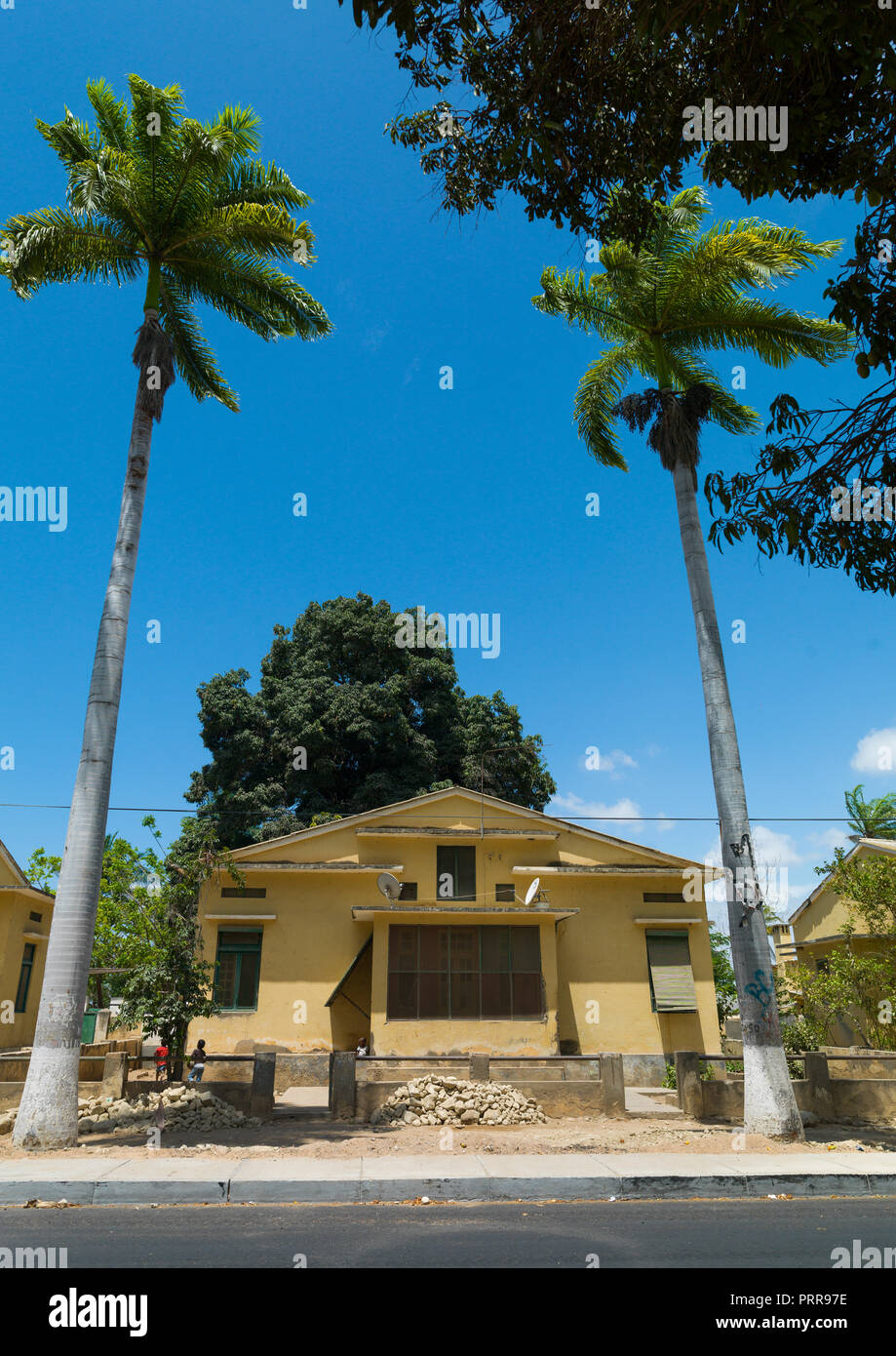 Old portuguese colonial house with palm trees, Namibe Province, Namibe ...