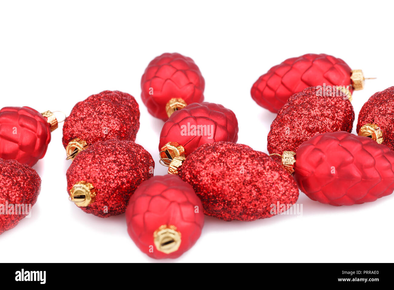 Christmas red cones isolated on white background Stock Photo - Alamy