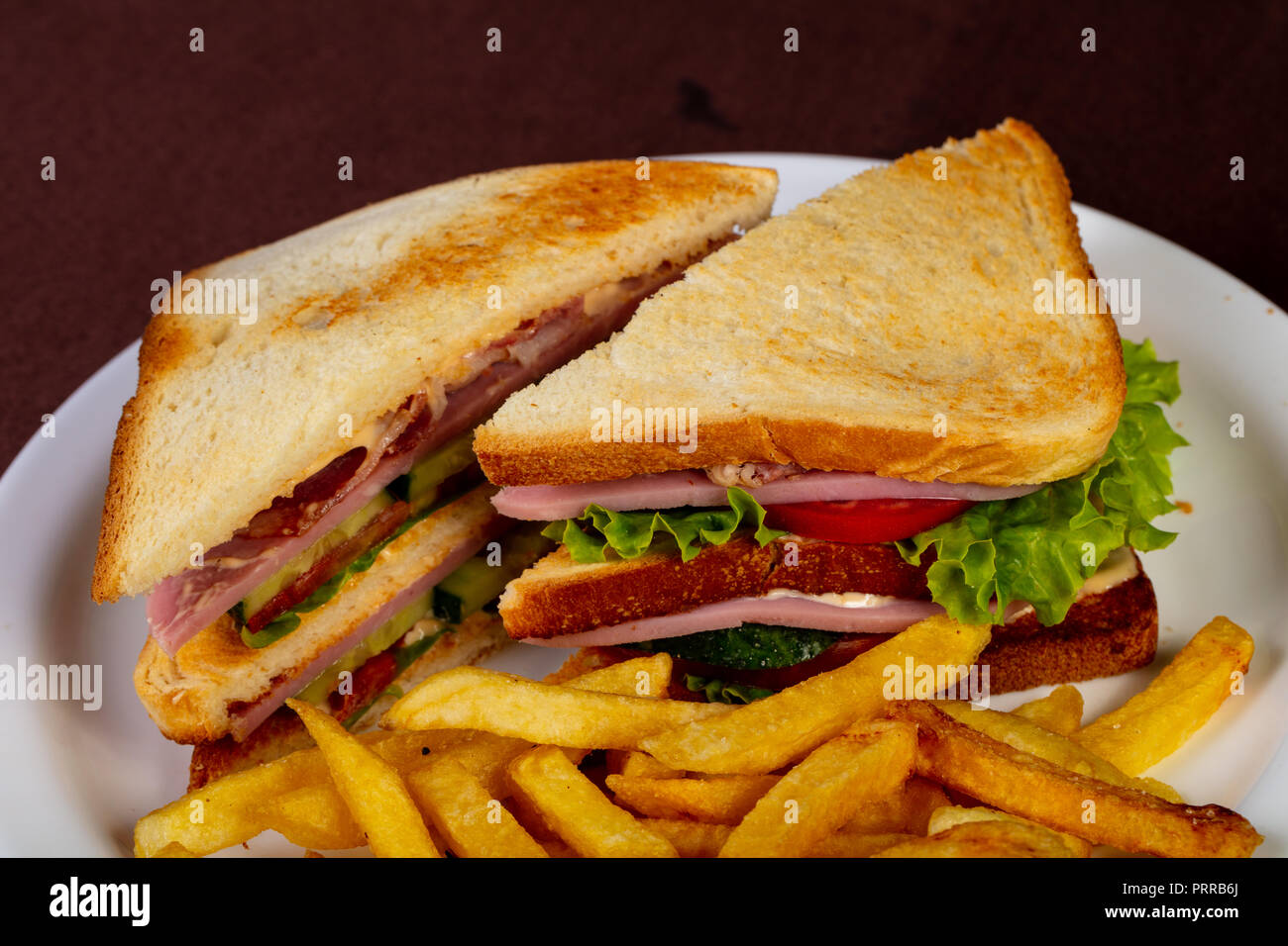 Club sandwich with ham and cheese Stock Photo - Alamy