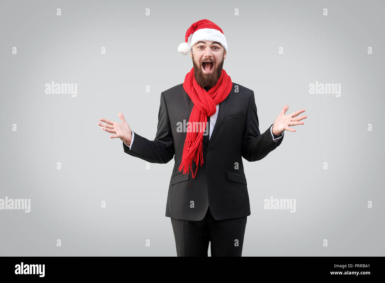 Portrait of berded handsome ma in classic black suit, red scarf and new ...