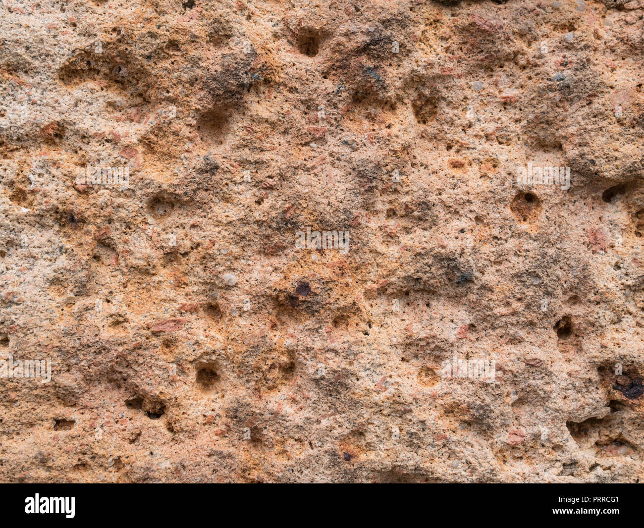 Ageing spongy sandstone wall showing signs of crumbling Stock Photo - Alamy