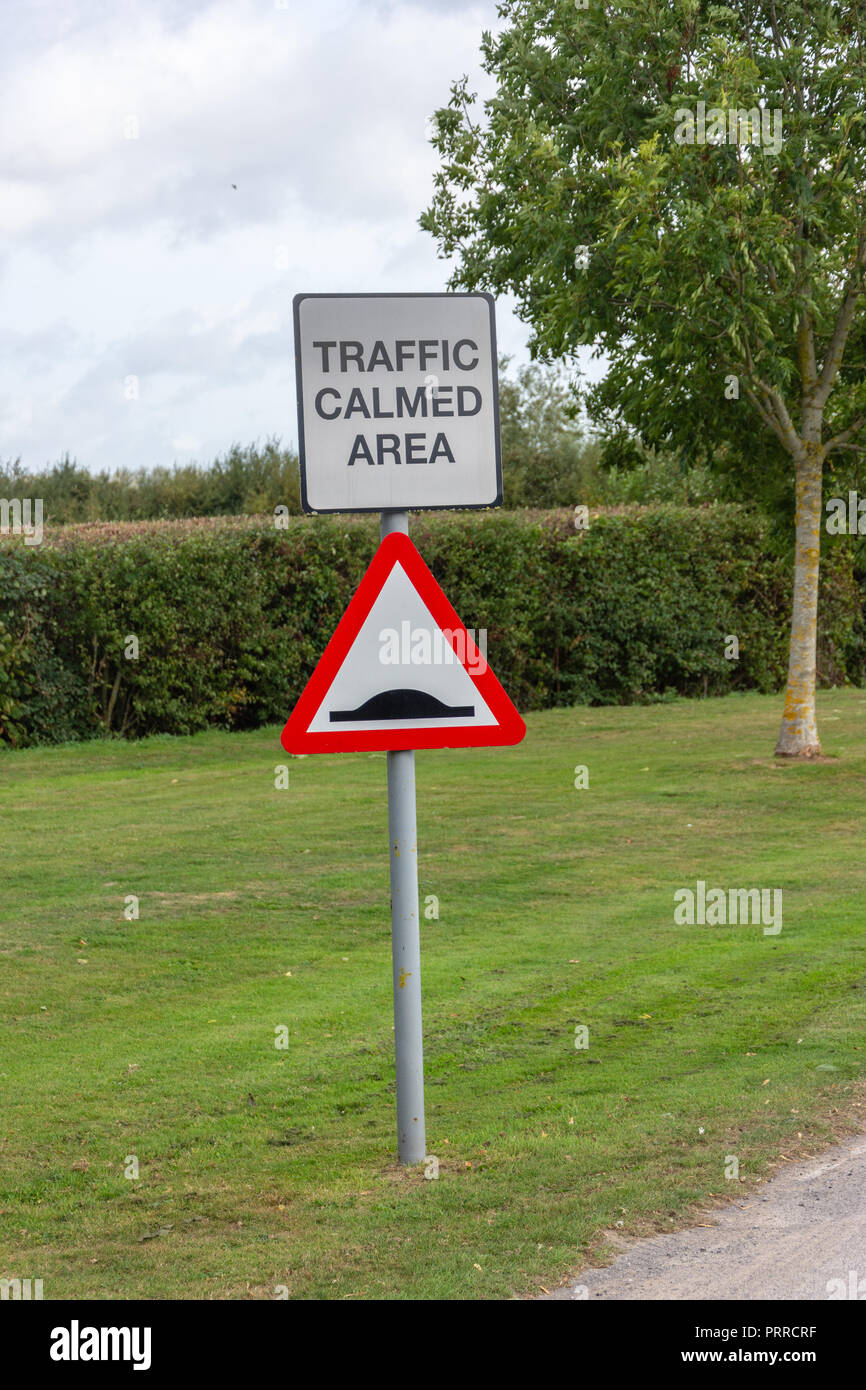 Road sign for traffic calmed area warning of speed humps Stock Photo ...