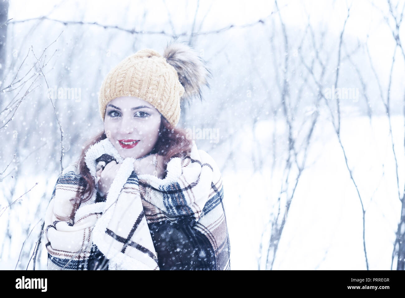 Beautiful girl in a beautiful winter snow Stock Photo - Alamy