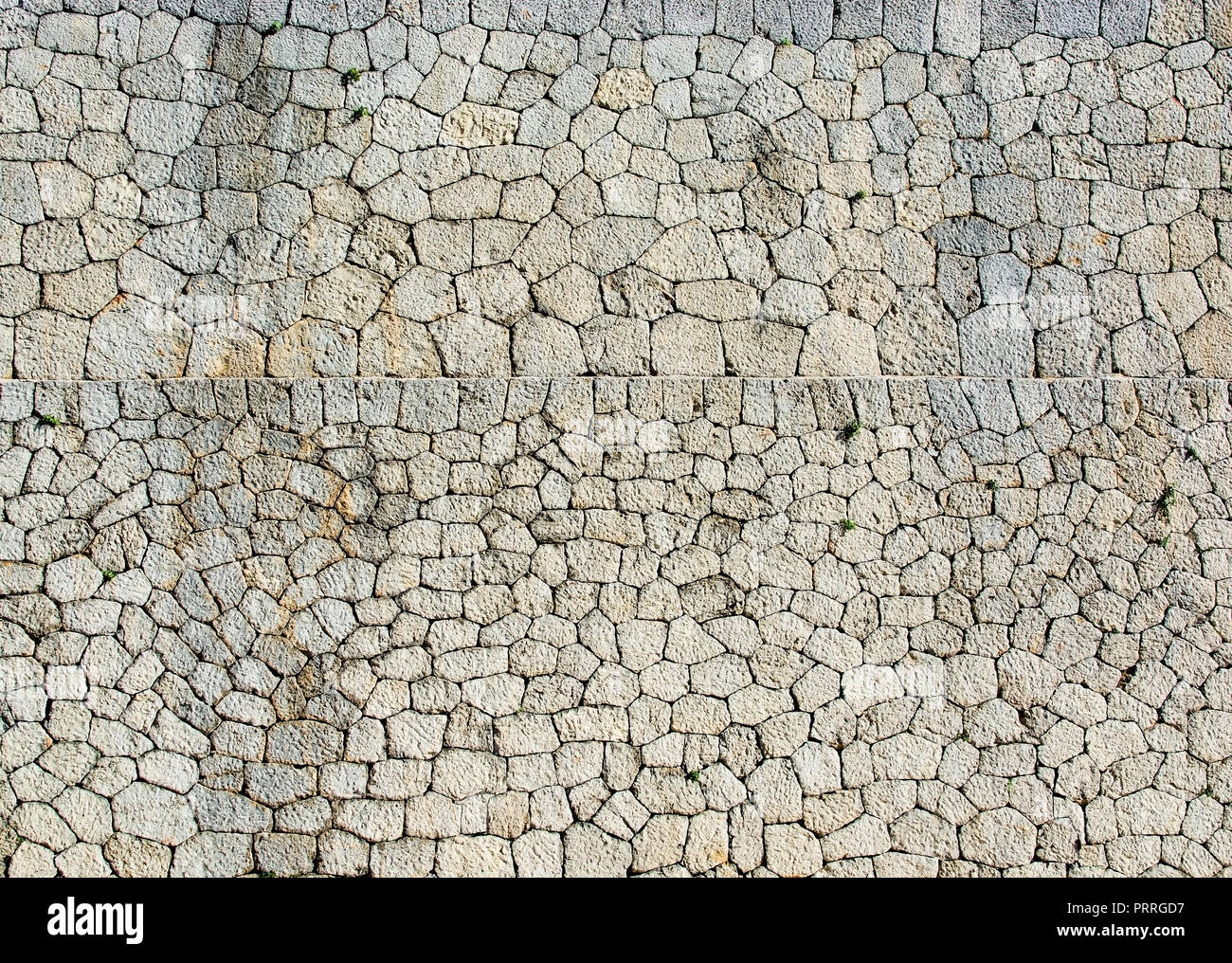 Cut fitted stones on wall handmade crafted building background texture ...
