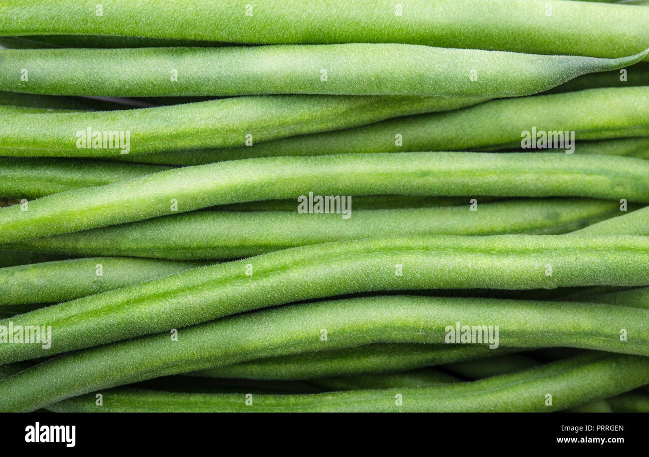 Background with green beans Stock Photo - Alamy