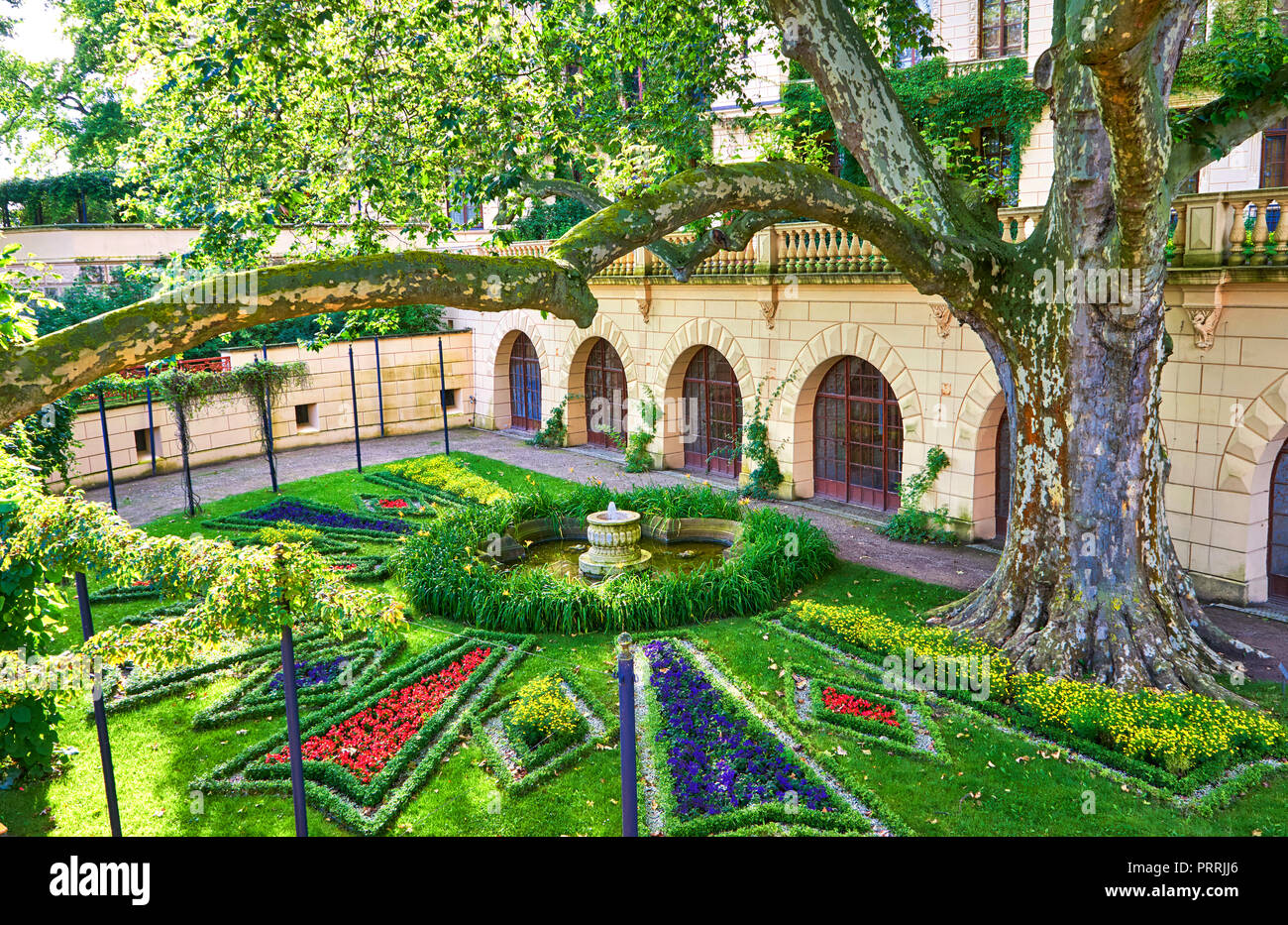 Beautiful park scene in public park with old tree and Fountain Stock ...