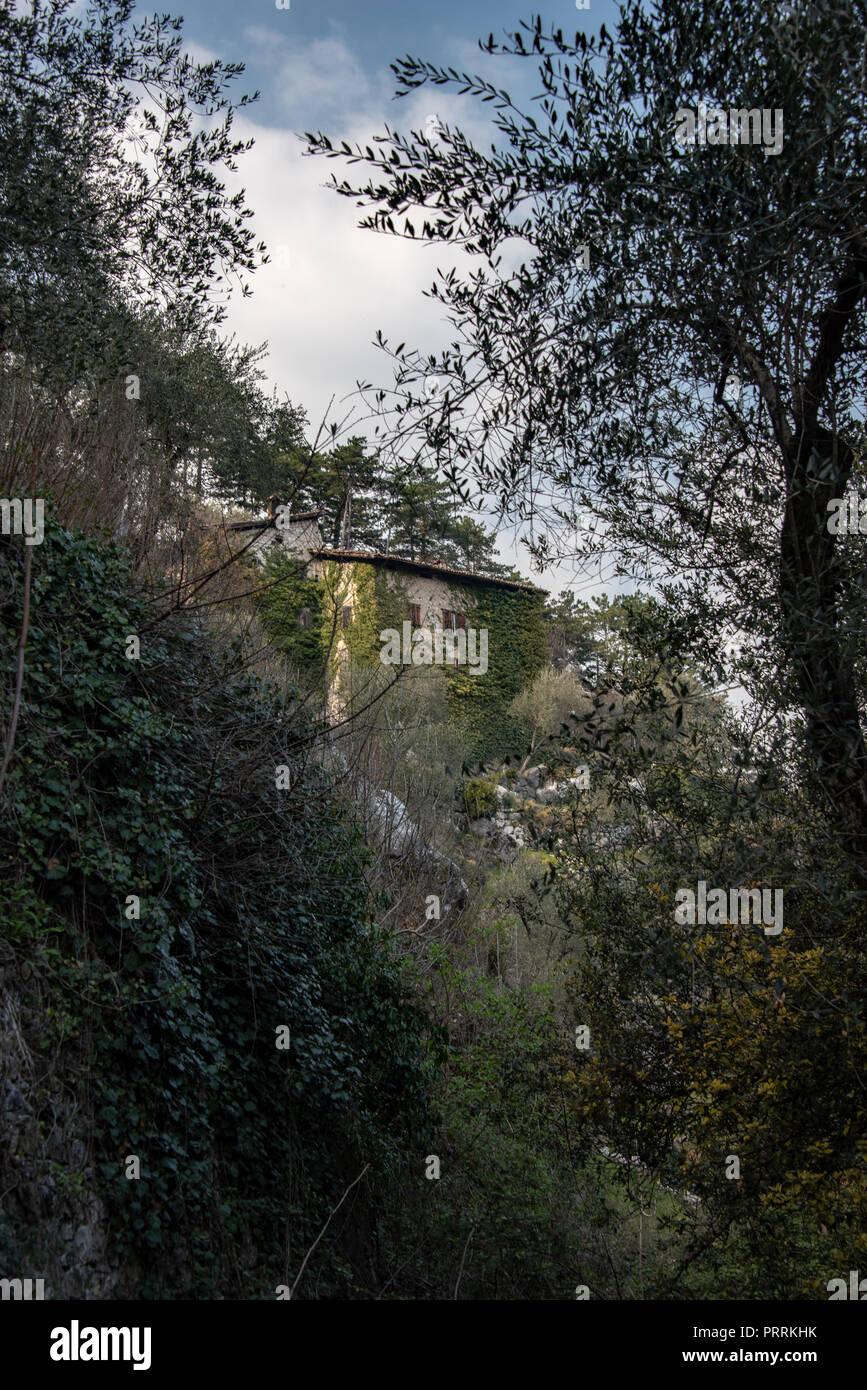 Pretty building in trees, Riva del Garda, Italy Stock Photo - Alamy
