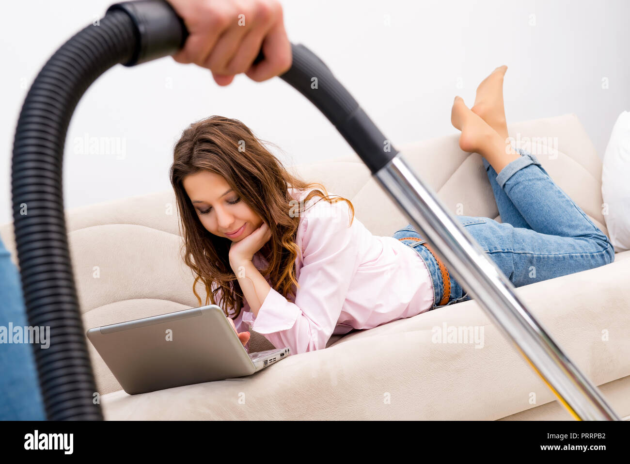 Cleaning the house with vacuum cleaner Stock Photo - Alamy