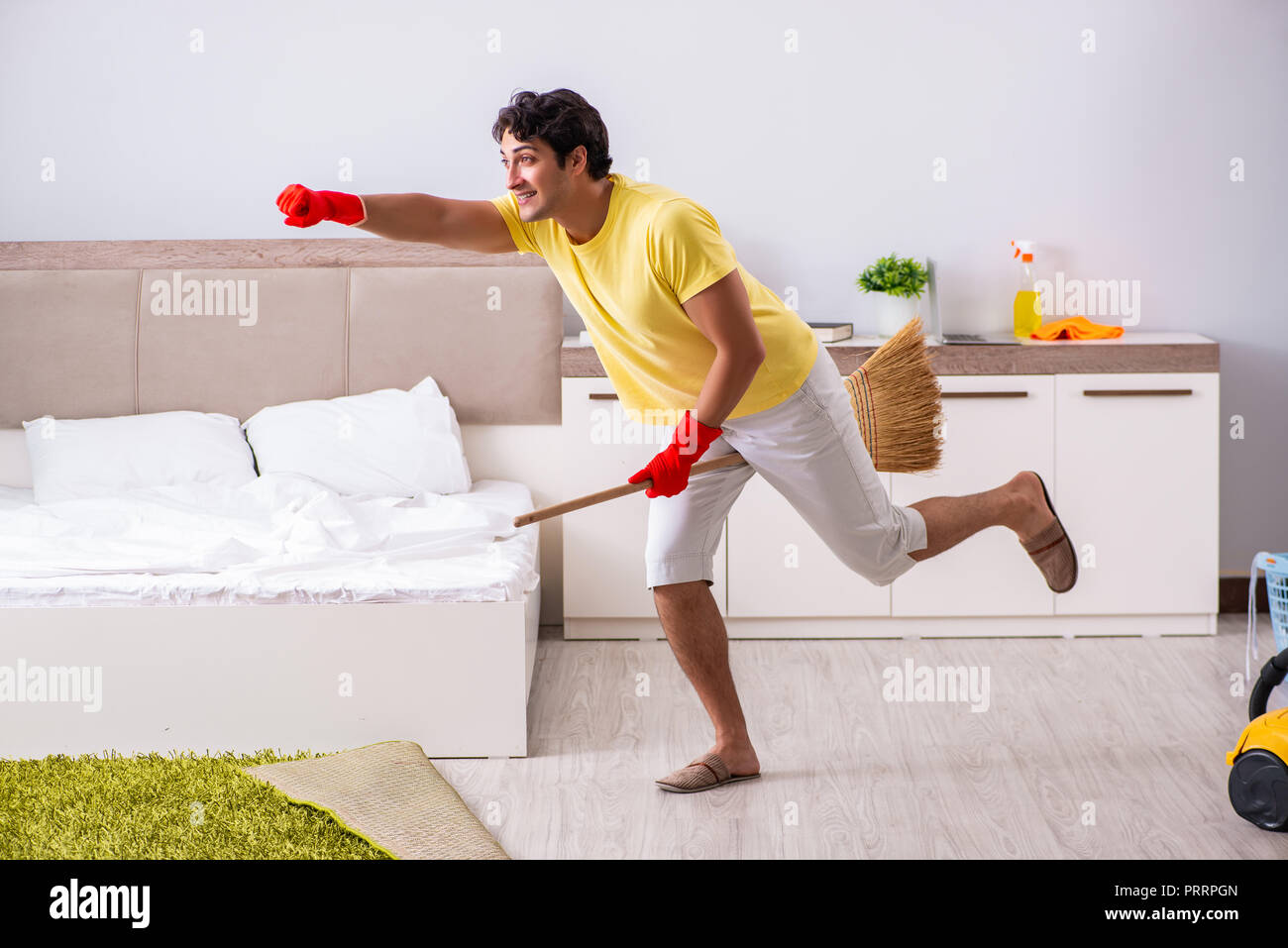 Man in bedroom running hi-res stock photography and images - Alamy