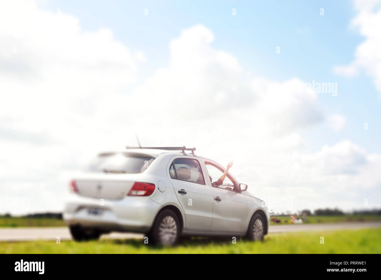 Arm out window driving hi-res stock photography and images - Alamy