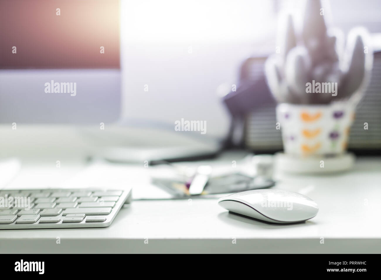 Computer desktop with white keyboard and mouse on working desk Stock ...