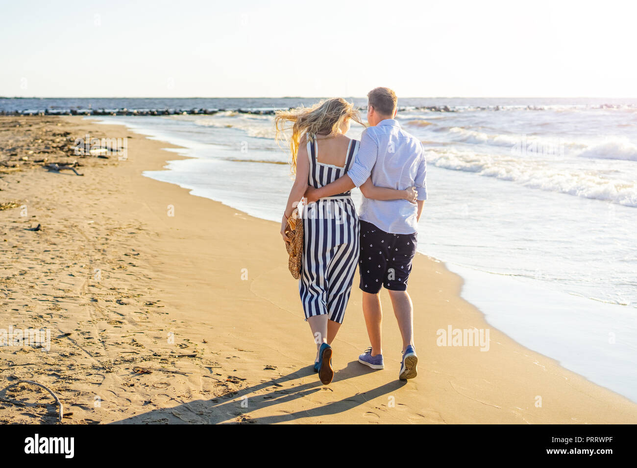 Rear view young stylish couple hi-res stock photography and images - Alamy