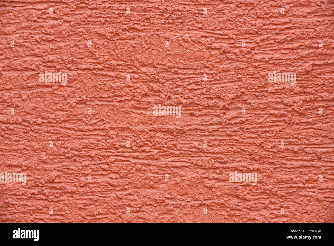 close-up view of red concrete wall textured background Stock Photo - Alamy