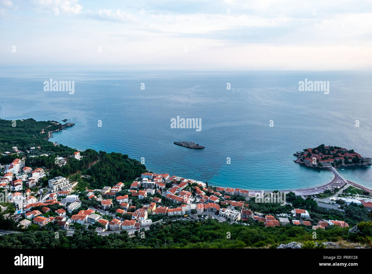 aerial view of Budva town and island of Sveti Stefan with hotel resort ...